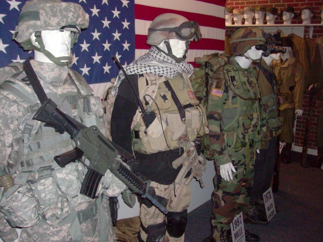 How do collectors display their military relic collections?